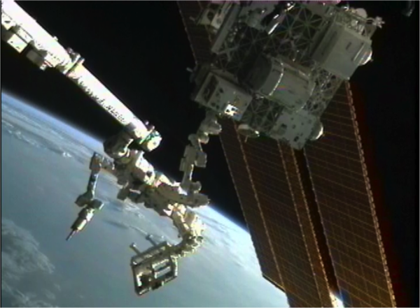 Space Station Working to Solve the Puzzle of Orbiting Satellite Repair