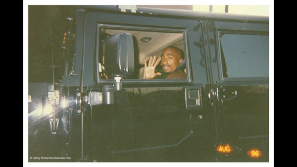 The Story Behind 2Pac in His Hummer Holding Up Five Fingers